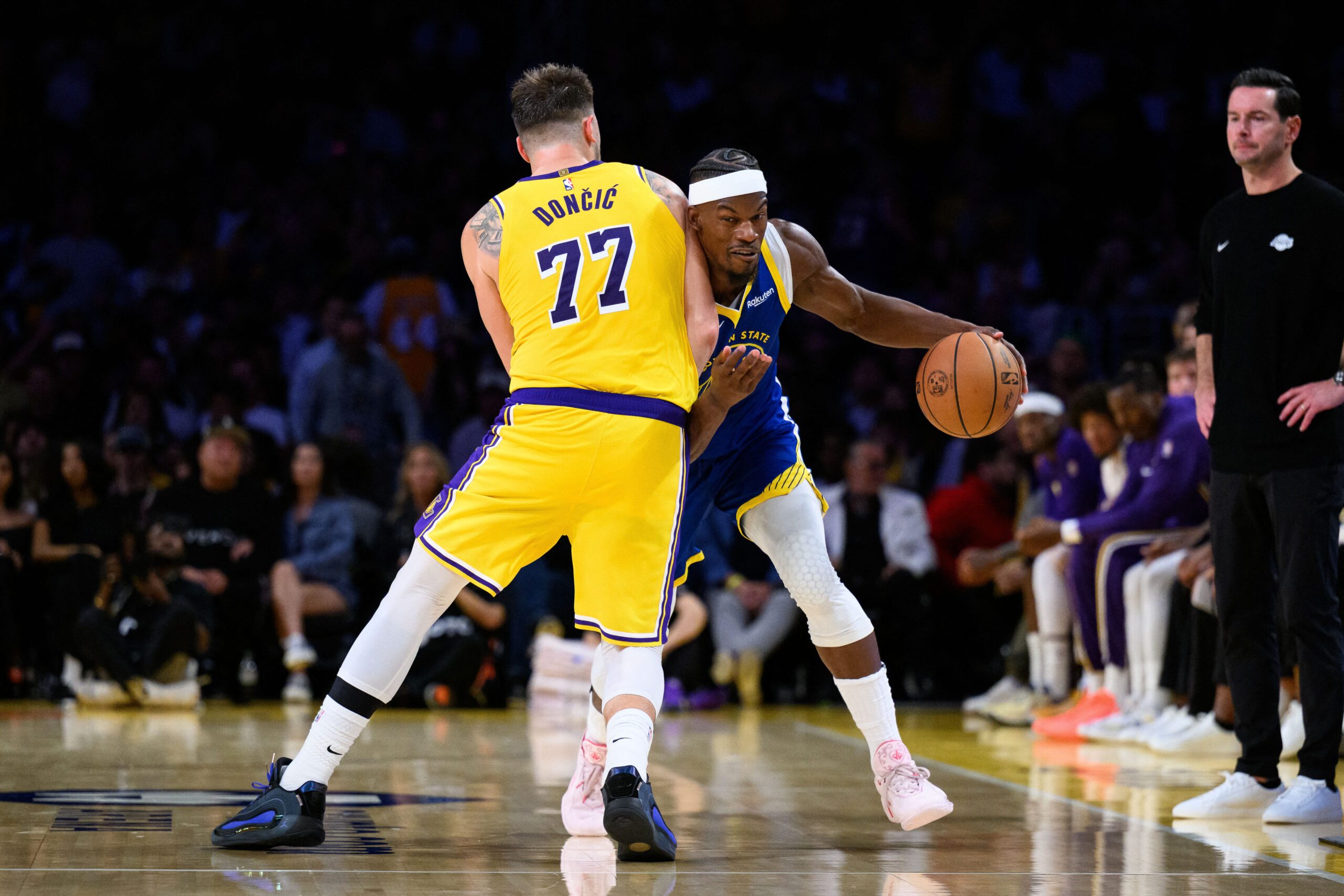 Butler leads way as Warriors edge LeBron-less Lakers in NBA season opener